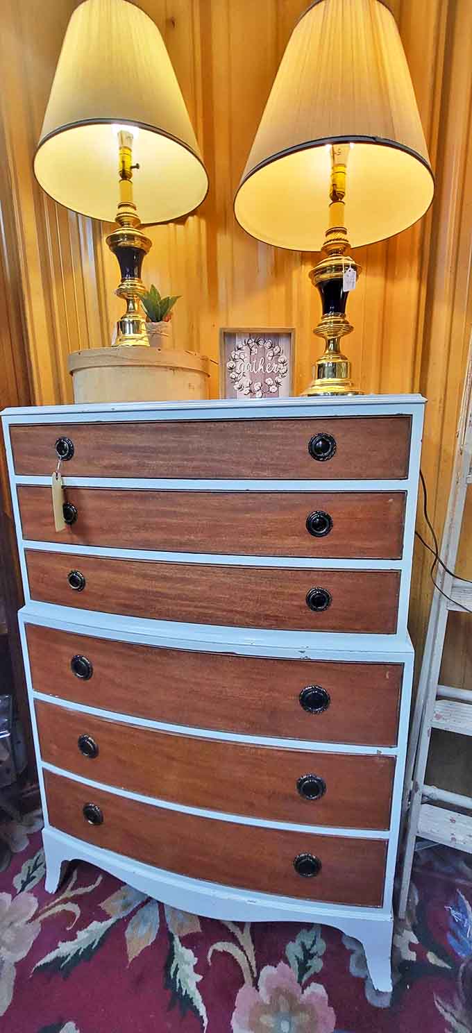 This two-tone dresser with matching brass lamps isn't just furniture&mdash;it's a ready-made time machine to Grandma's guest bedroom circa 1965.