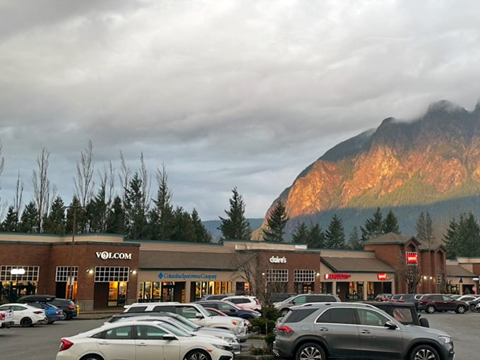 Golden hour hits those mountain slopes while shoppers hunt for deals, proving multitasking works beautifully in nature.