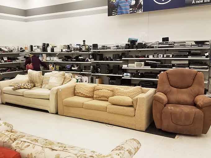 Couches and electronics living together in perfect harmony, like the odd couple that actually makes sense when you see the price tags.