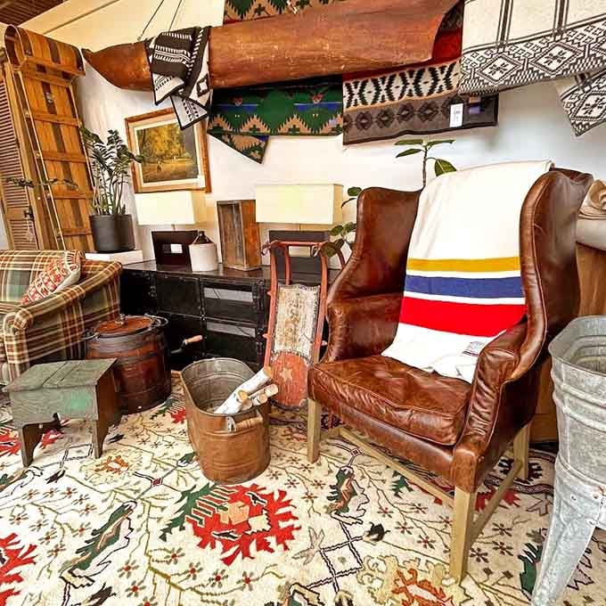 A perfectly staged vignette that whispers "rustic luxury." That leather chair isn't just furniture&mdash;it's a time machine to a more civilized era.