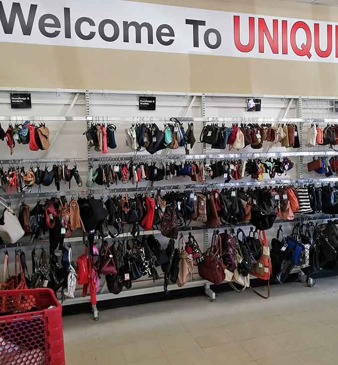 Handbag heaven awaits! Rows upon rows of purses in every imaginable color create a fashionista's dream landscape of second-chance accessories.