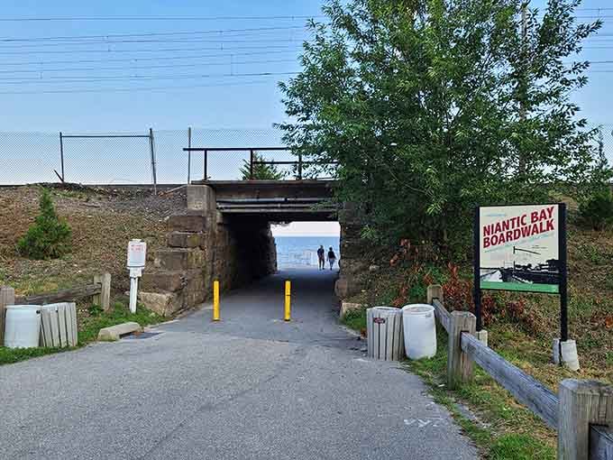 The famous "hole in the wall" isn't metaphorical—it's this charming tunnel that serves as a portal to paradise.