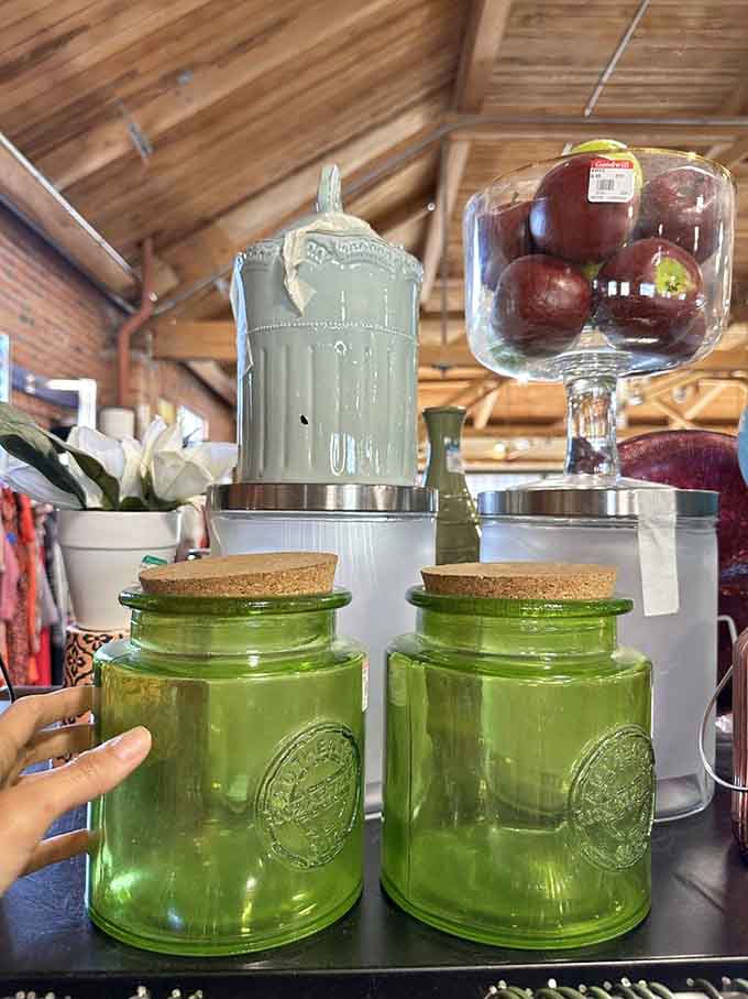 Vintage green glass jars that would make your grandmother weep with joy, just waiting to organize your kitchen.