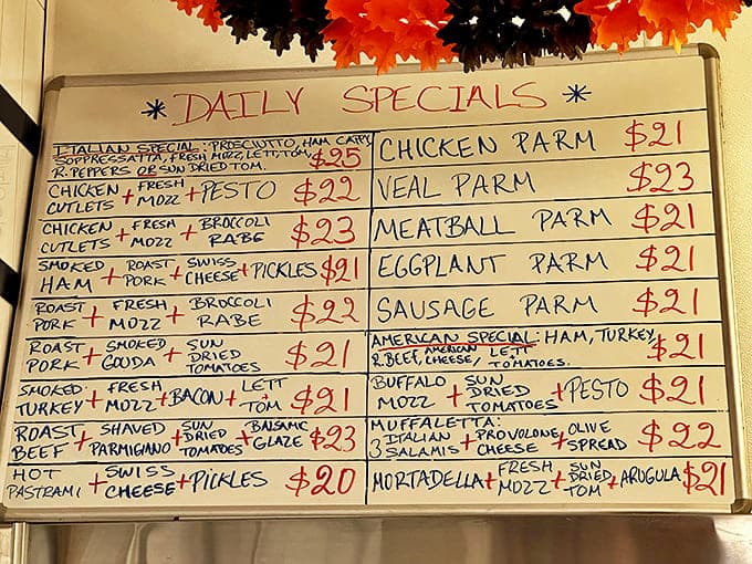 This handwritten menu board isn't just listing sandwiches&mdash;it's poetry for the hungry, a roadmap to happiness between two slices of bread.