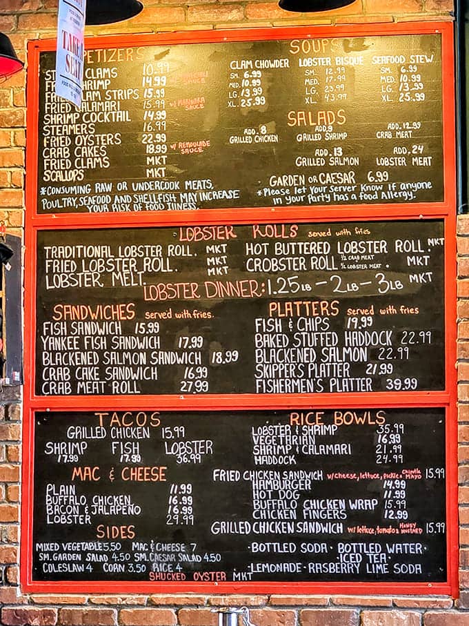 The menu board tells you everything you need to know - seafood is the star here, prepared with respect rather than reinvention.