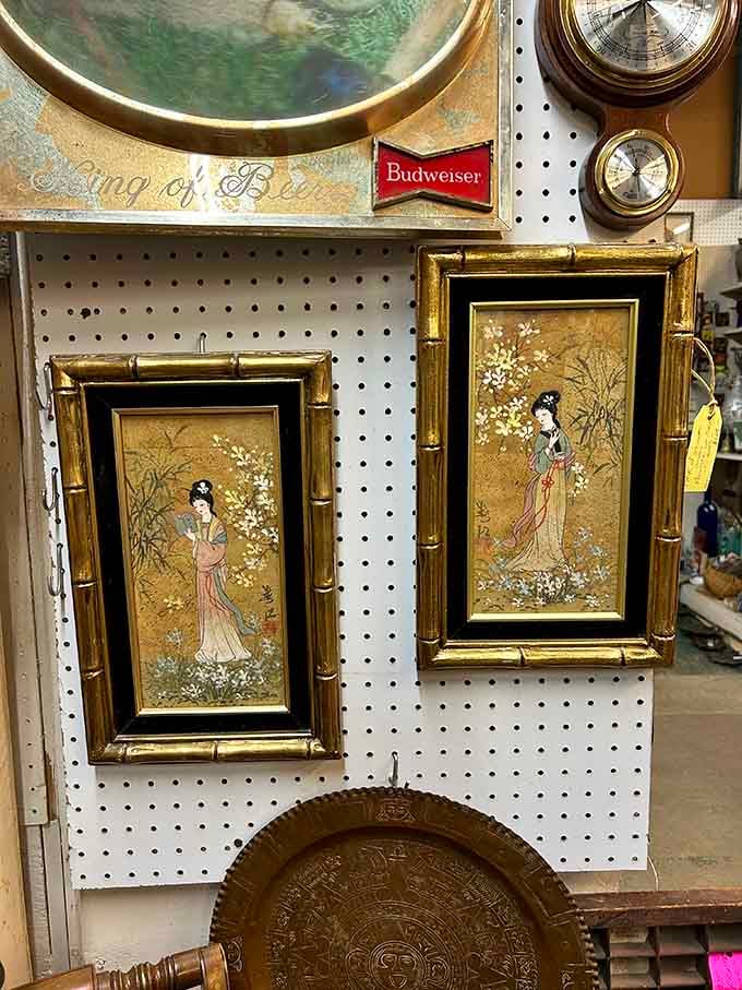 Those bamboo-framed Asian artworks are giving serious 1970s elegance vibes, and honestly, they're pulling it off beautifully.