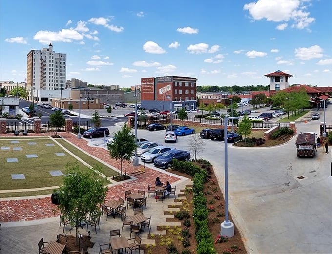 Urban renewal meets small-town charm in this downtown gathering space, where brick pathways invite leisurely strolls between shopping and people-watching.