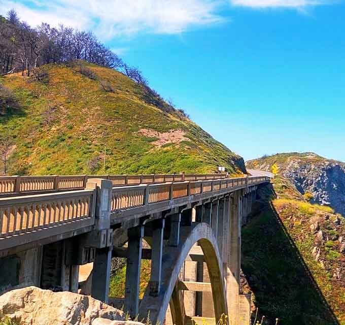 Bixby Bridge stands as California's architectural sonnet to engineering, where concrete and courage meet 260 feet above the canyon floor.