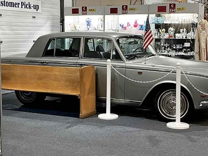 Not just any vintage car&mdash;this elegant silver beauty sits regally behind velvet ropes, silently telling stories of bygone road trips.