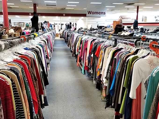 Not just racks, but galaxies of clothing options stretching toward the horizon. Marie Kondo would need therapy after this.