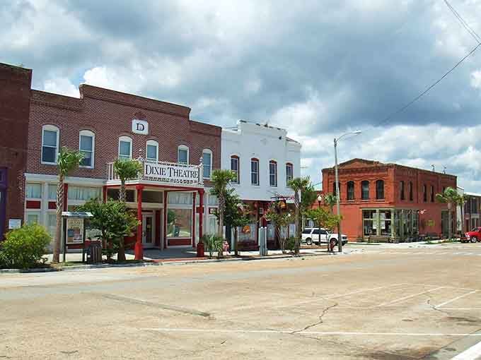 The Dixie Theatre marquee stands as a proud reminder when downtown meant something special, not just another strip mall.