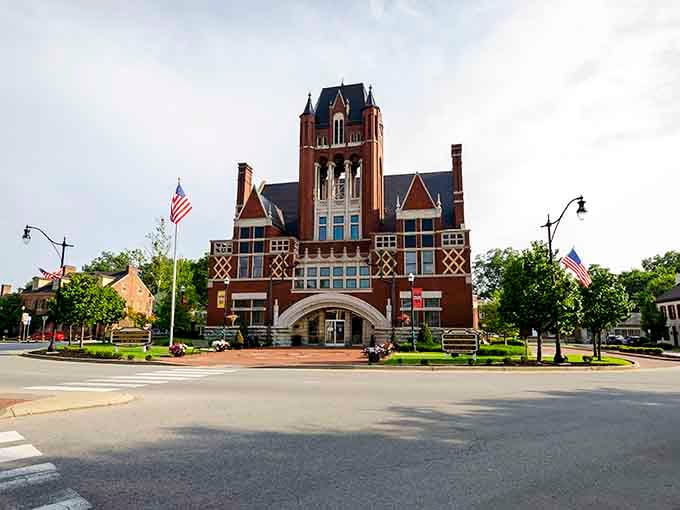 That courthouse tower rises like something from a Victorian postcard, commanding attention with its ornate brickwork and timeless elegance.