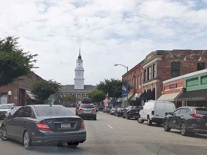 Downtown Bennettsville's historic charm beckons with its iconic clock tower standing tall against a Carolina blue sky.