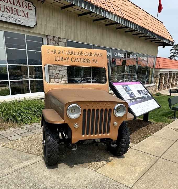 That wooden Jeep cutout welcomes visitors to a treasure trove of horse-drawn carriages and early automobiles.