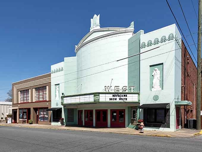 The West Theatre's Art Deco curves and mint-green trim make it look like a mint julep turned into architecture.