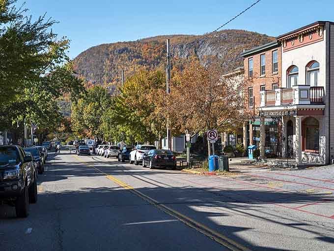 Autumn paints the hillside behind town in colors that would make Bob Ross reach for extra brushes.