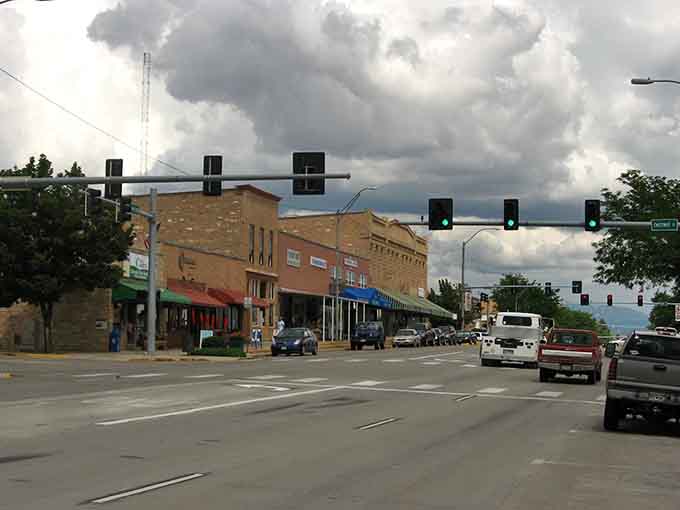 Dramatic clouds roll over downtown streets where the cost of living won't give you storm-level anxiety.