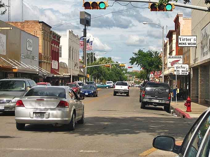 Eagle Pass's Main Street captures that perfect small-town Texas vibe. American flags flutter above locally-owned shops where your dollar stretches like Texas itself.