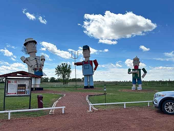 The Tin Family greets travelers with metallic waves, like American Gothic got super-sized and moved to the prairie.