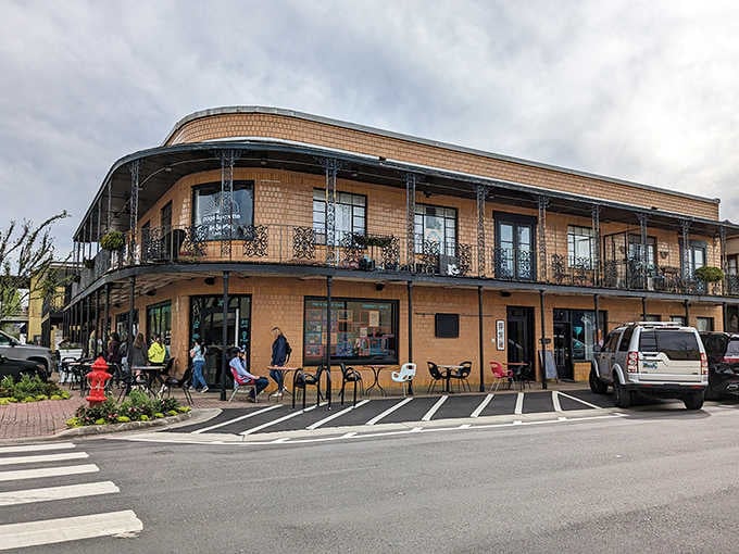 This elegant two-story building in Fairhope showcases the town's architectural charm, with wrought-iron balconies reminiscent of New Orleans' French Quarter.