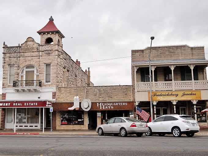 Stone towers rise above the street like sentinels, their European-inspired architecture whispering tales of German heritage and determination.