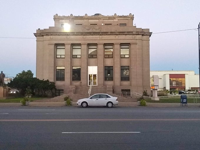 Gary's classical stone building catches the evening light, standing dignified against the changing sky near the lakefront.