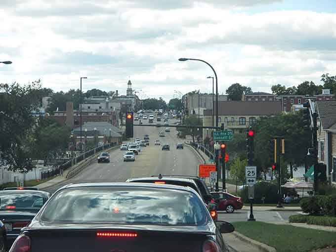 Busy streets and scenic views await you as you drive through Geneva, where historic charm meets the steady afternoon traffic.