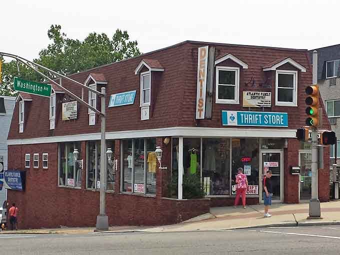This charming brick corner building with dormer windows looks like it's been keeping neighborhood secrets for decades.