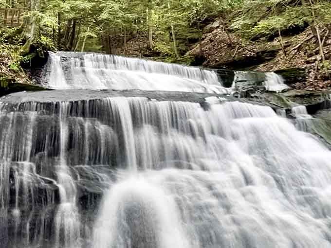 Multiple cascades tumble through this narrow gorge, creating nature's own amphitheater with perfect acoustics for rushing water.