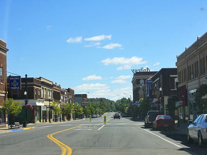 Rolling hills frame this main street view where the pace is gentle and the living is genuinely affordable.