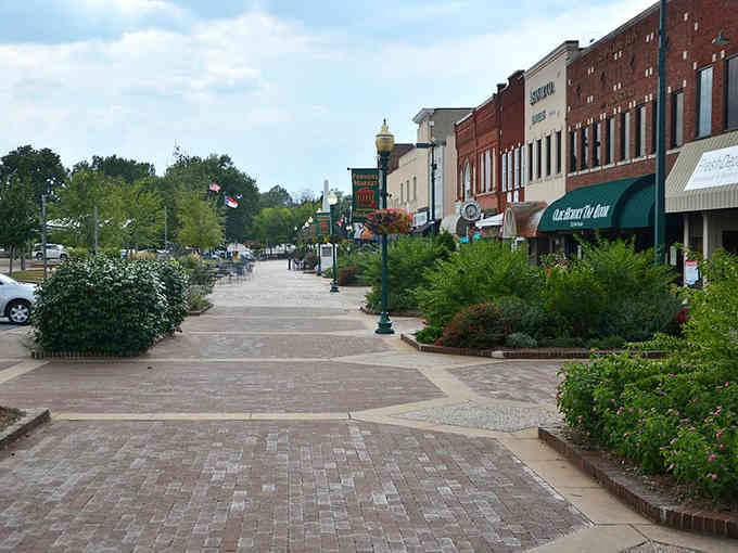 Tree-lined streets create natural shade umbrellas for leisurely afternoon strolls through downtown.
