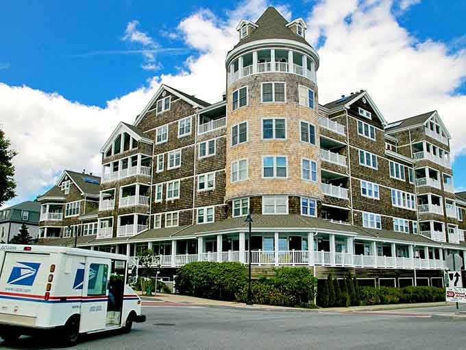 This beautiful shingled building showcases Jamestown's classic New England architecture with multiple levels of porches and stunning coastal charm.