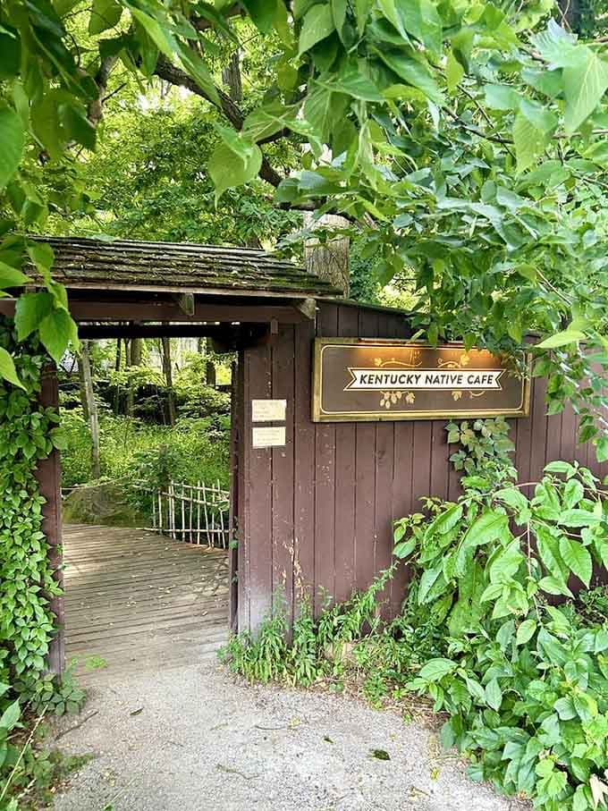 Like finding Narnia through a wardrobe, this vine-covered entrance leads to a peaceful garden dining escape.