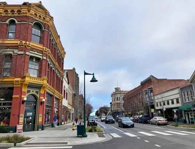 Victorian-era buildings stand proud along these streets, their ornate details whispering stories from a bygone era of elegance.