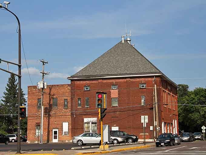 This charming red brick armory building stands proud like a fortress guarding small-town memories and community gatherings.