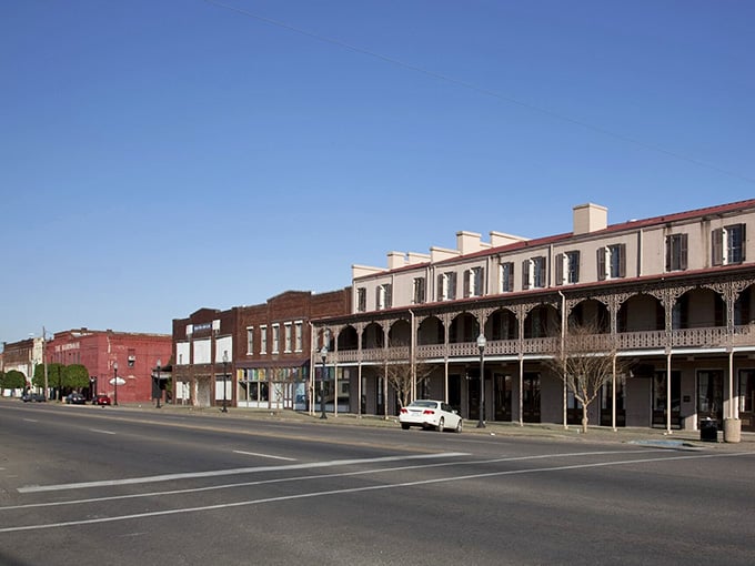 Iron balconies and brick buildings frame a street where American history changed forever, one march at a time.