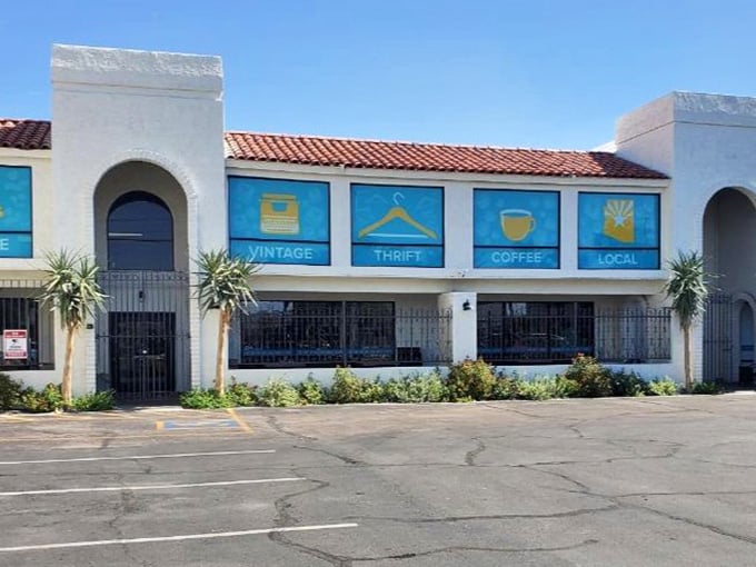 The bright blue windows spell out the perfect combination: vintage finds, thrift prices, coffee breaks, and local community spirit.