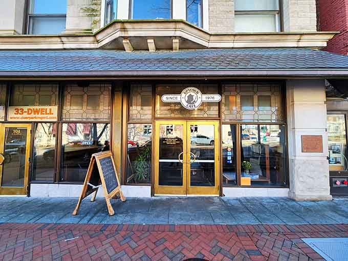 The golden storefront doors invite you inside where breakfast dreams come true every single morning.