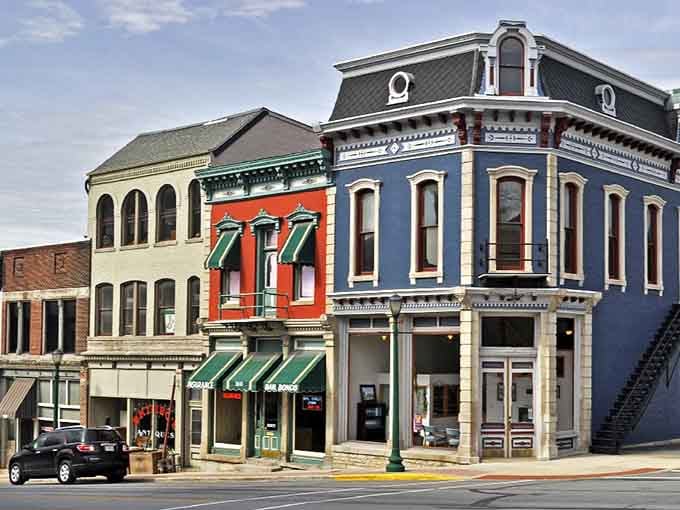 These painted Victorian buildings look like they raided a crayon box, and honestly, we're here for it.