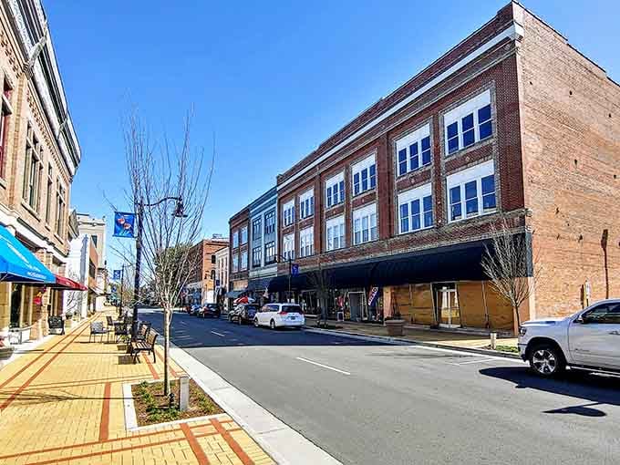 Classic brick architecture meets modern sidewalks in this beautifully preserved downtown that respects its past.