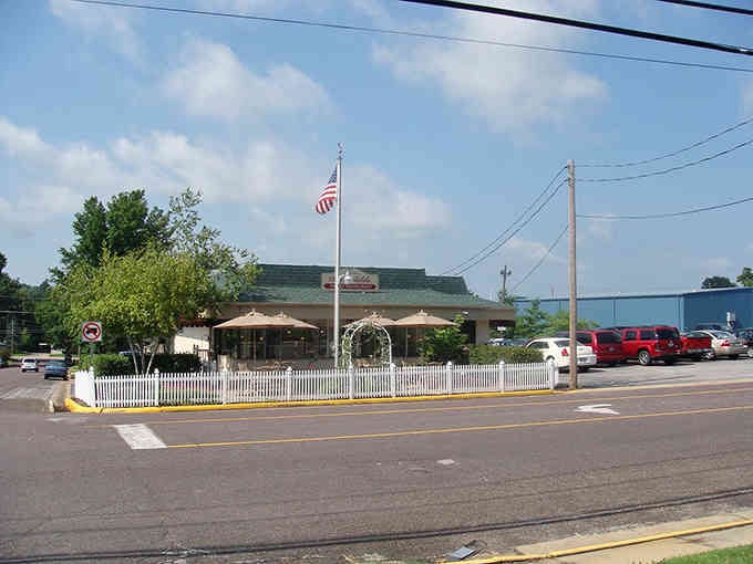 That white picket fence and green roof signal good times ahead&mdash;small-town dining where everyone becomes a regular eventually.
