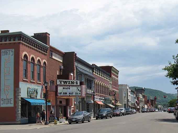 The Twin-1 theater marquee beckons like a time machine, offering entertainment without the Manhattan ticket shock.