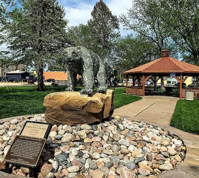 Nature's bodybuilder! This impressive bear statue guards Bigfoot Crossroads Museum with the confidence of a creature who knows he's photogenic.