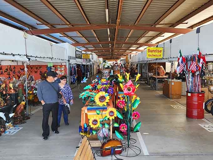 Bright sunflowers and patriotic flags create a cheerful marketplace atmosphere that lifts your spirits while you shop.