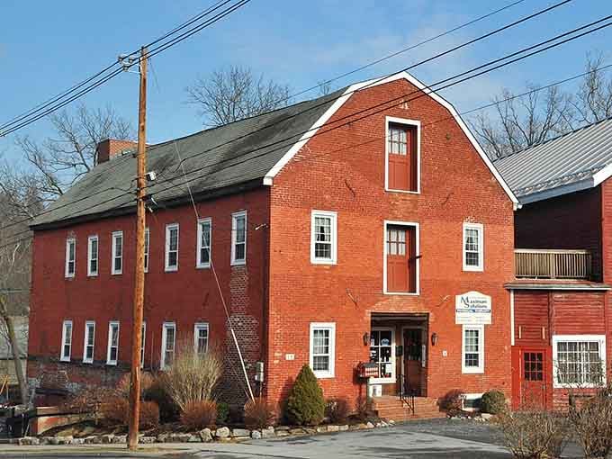 That red brick building stands solid and proud, a testament to craftsmanship from an era when things were built to last.