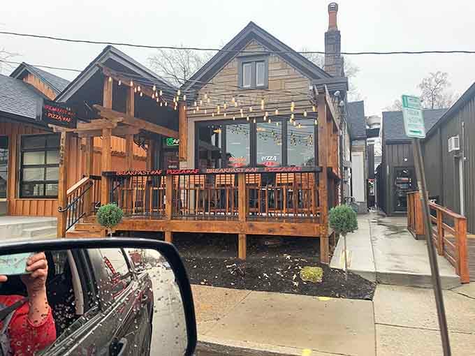 That rustic wooden deck with string lights overhead transforms ordinary breakfast into an event worth celebrating with friends and family.