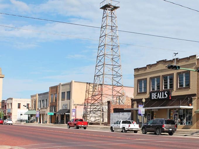 Breckenridge's historic downtown showcases its oil boom heritage with the iconic derrick standing proudly among well-preserved Main Street buildings.
