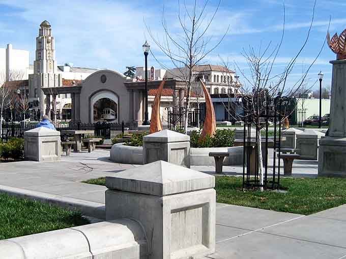 A peaceful plaza with sculptural benches invites you to sit and watch the world slow down.