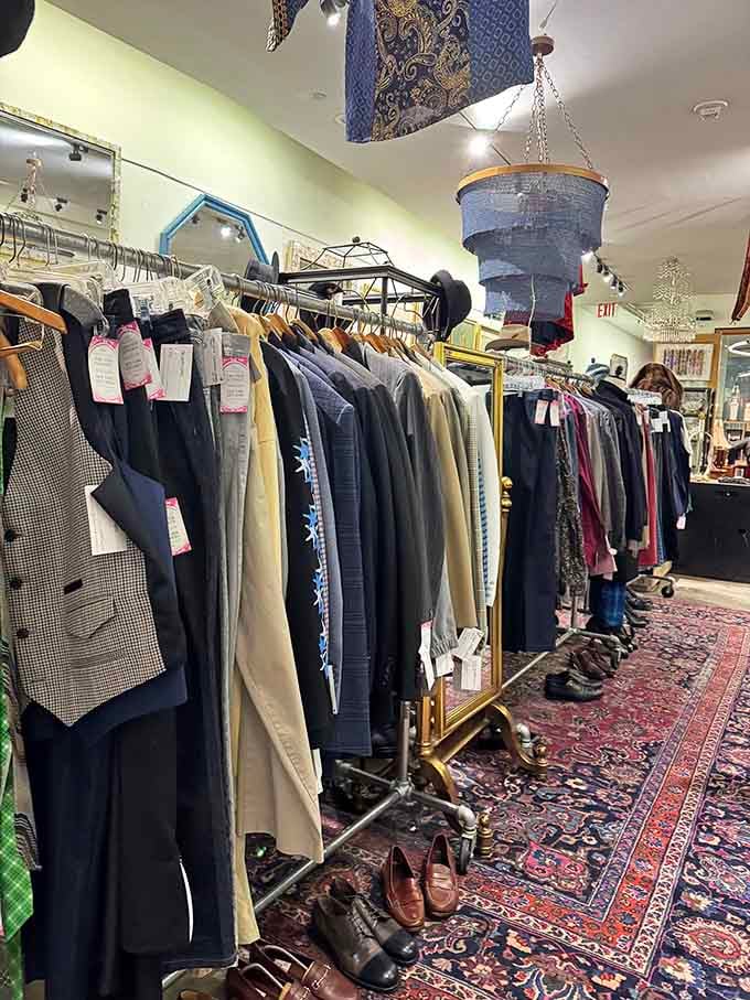 Inside, racks overflow with curated vintage pieces displayed on Persian rugs like a fashionable time capsule.