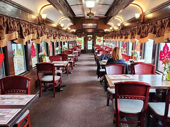 Vintage train car interiors with original curved ceilings make breakfast feel like a journey through American history.